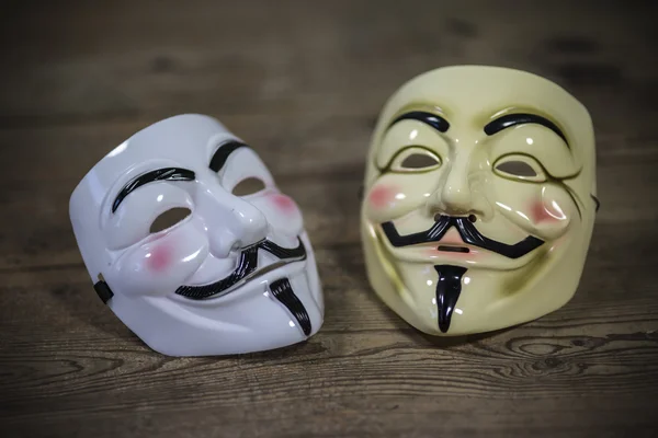 White and yellow anonymous masks – Stock Editorial Photo © jarin13 ...