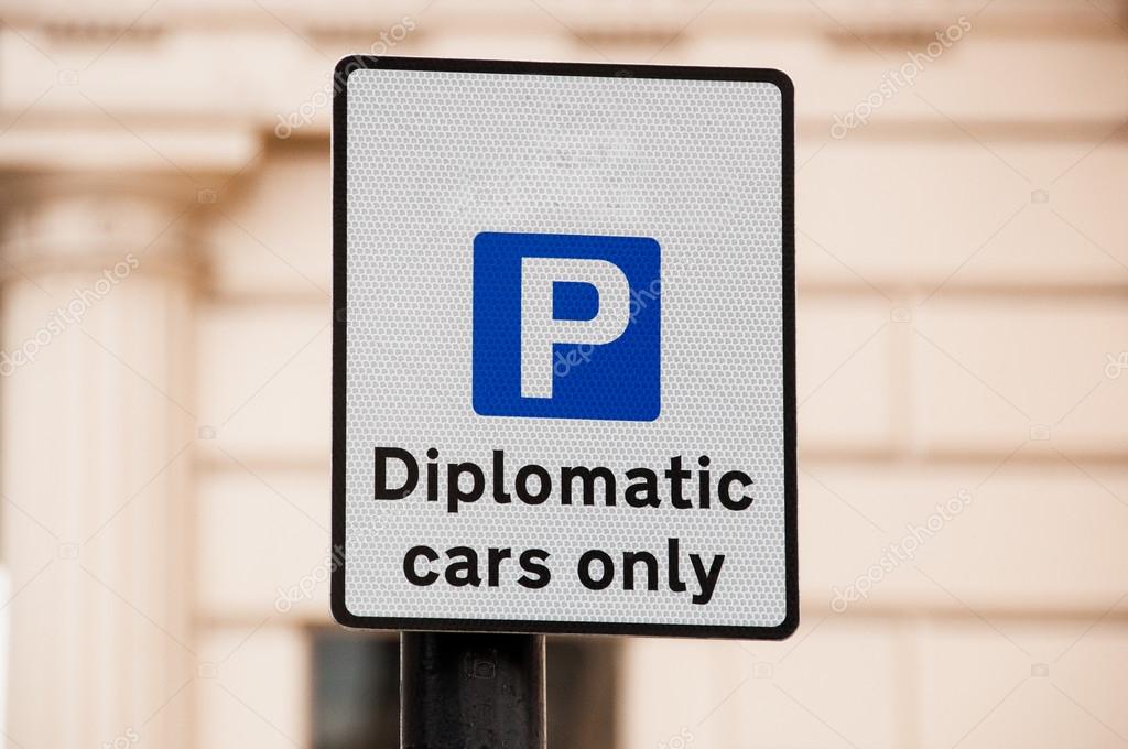 Road sign for car parking Diplomatic cars only — Stock Photo © kk_tt ...