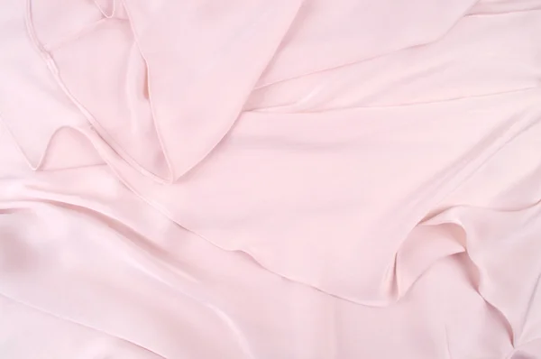 Light pink silk drape, background or texture. Pink silk material ...