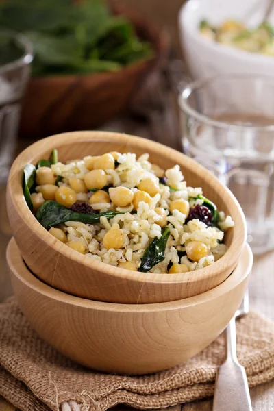 Salad with rice, chickpeas, spinach, raisins - Stock Image - Everypixel