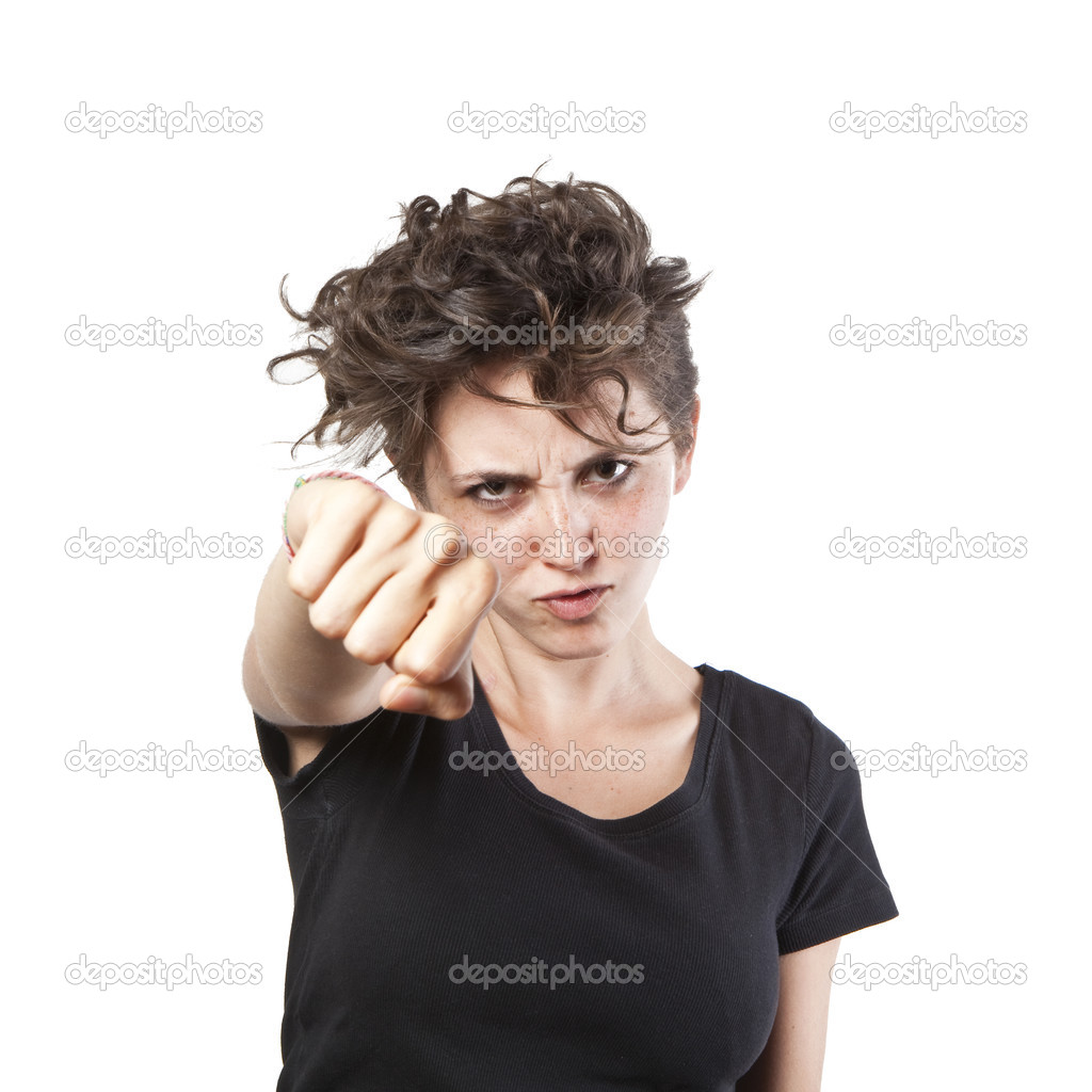 Pretty young brunette woman throwing a punch — Stock Photo ...