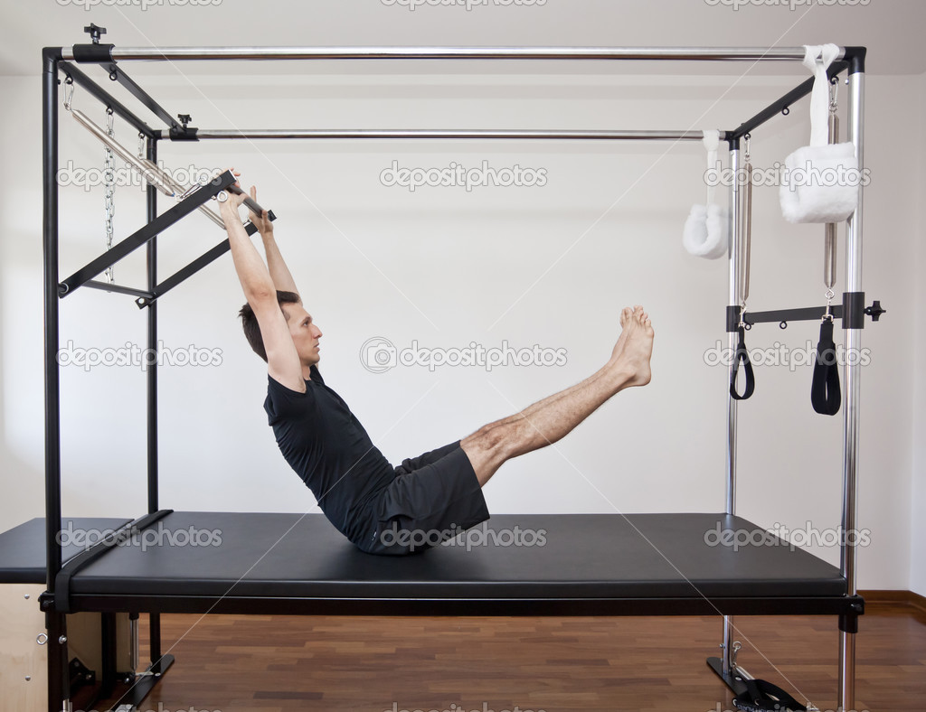Man practicing pilates — Stock Photo © tommasolizzul #13630554