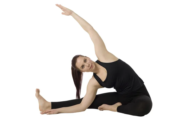 A woman on a twist yoga pose Stock Photo by ©kozzi2 19192511
