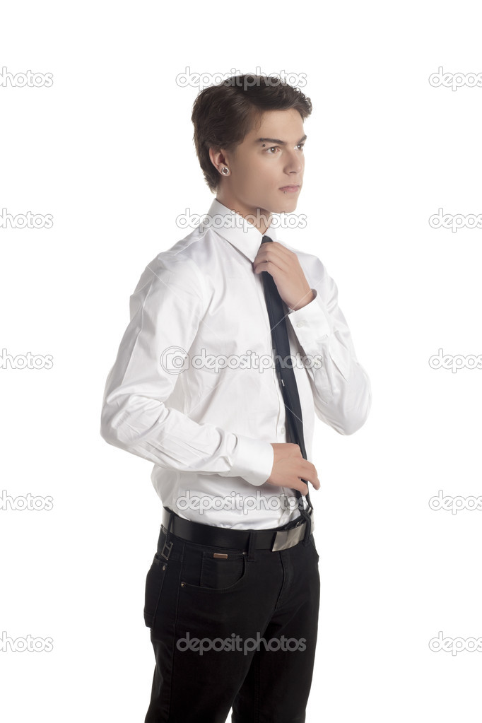 Handsome guy holding his tie Stock Photo by ©kozzi2 17203767