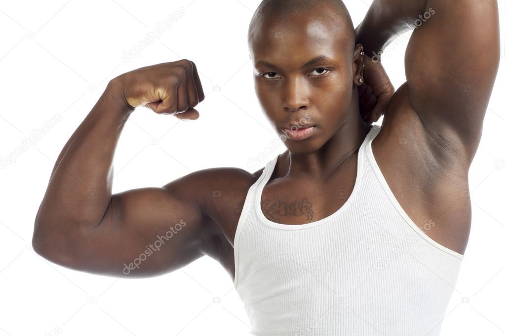 Black guy showing his big bicep — Stock Photo © kozzi2 #18745709