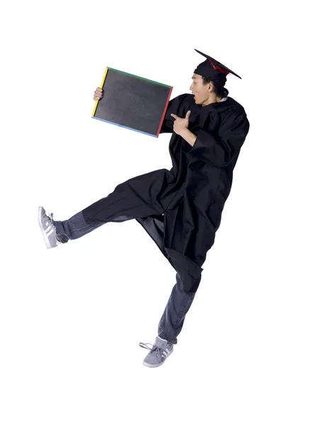 Male graduate jumping Stock Photo by ©kozzi2 17433679