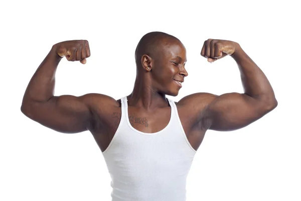 Black guy showing his big bicep — Stock Photo © kozzi2 #18745709