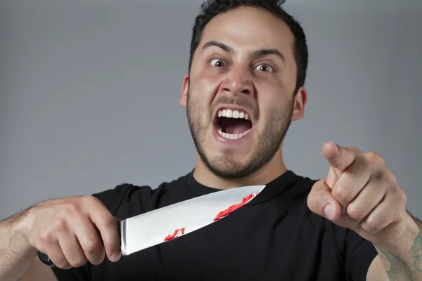 Angry man with a knife Stock Photo by ©kozzi2 20322529