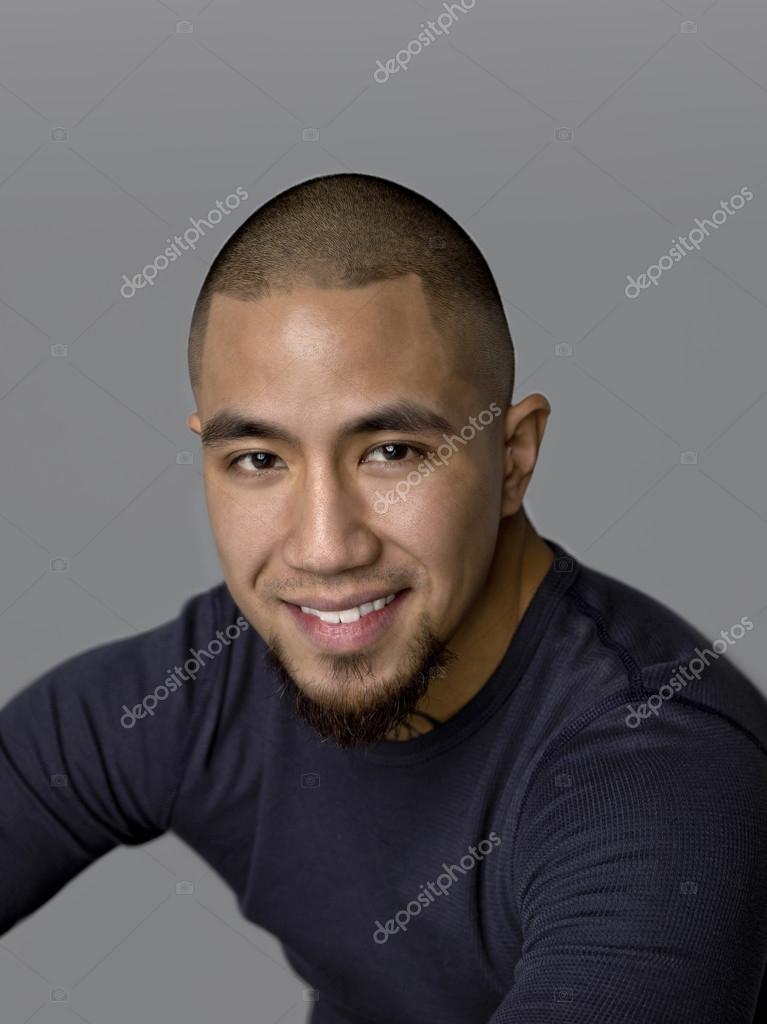 Attractive male model smiling Stock Photo by ©kozzi2 20337485