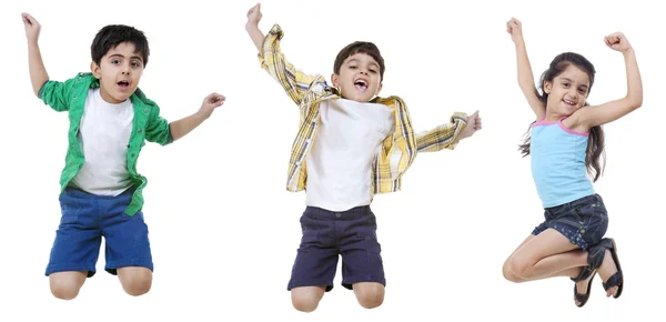 Happy children jumping Stock Photos, Royalty Free Happy children ...