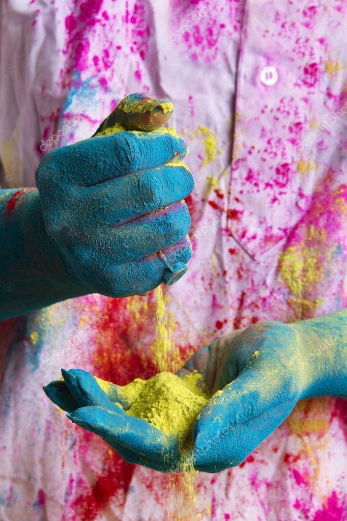 Blue colored hands holding powder paint — Stock Photo © iphemant #51100579