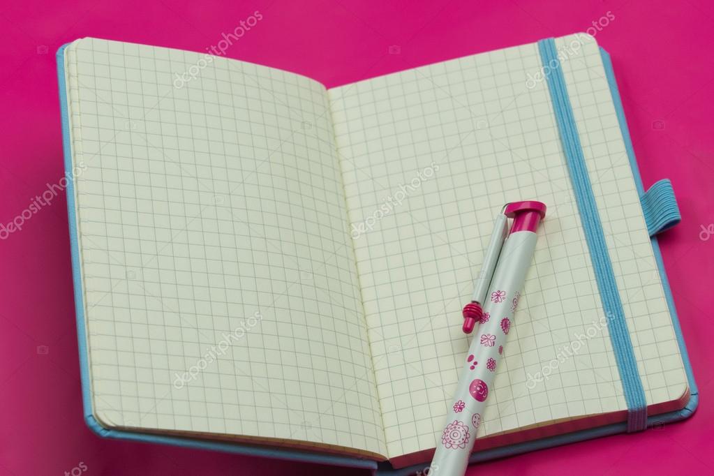 Notebook on the pink background Stock Photo by ©Szafran 32481765
