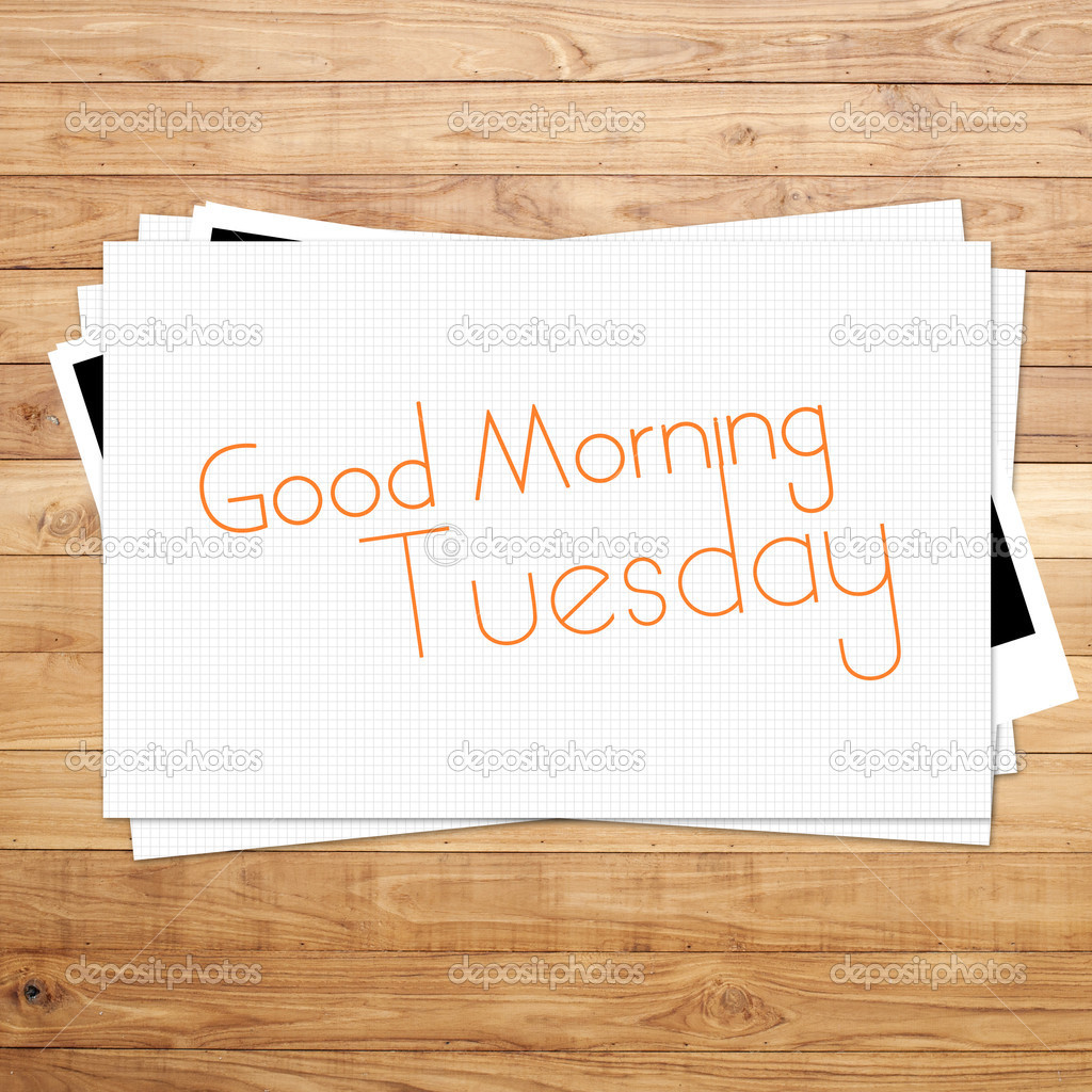 Good Morning Tuesday on paper and Brown wood plank background Stock ...