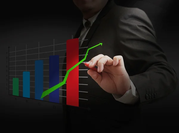 Male hand drawing a chart - Stock Image - Everypixel