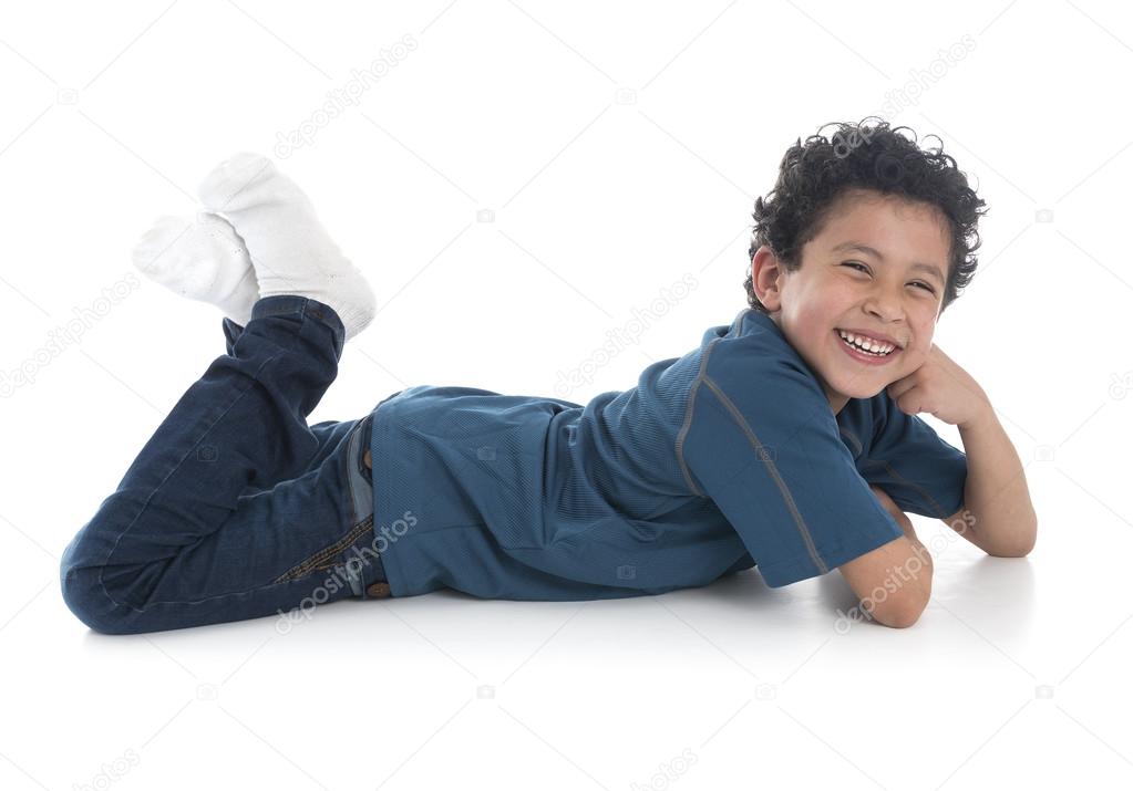 Beautiful Boy Laying Down — Stock Photo © MidoSemsem #48665495