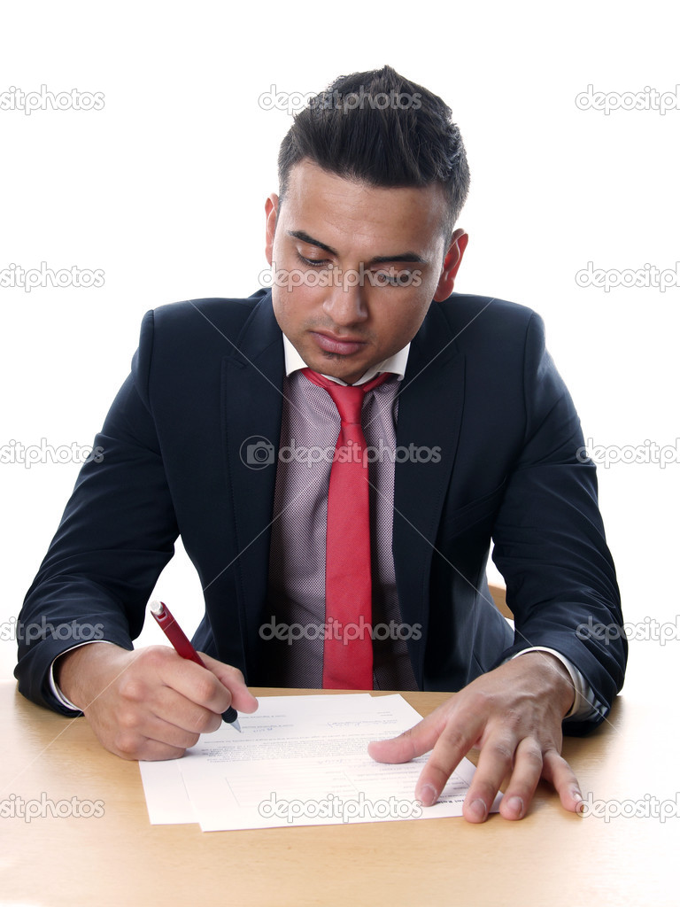 Young man signing contract Stock Photo by ©buecax 33602857