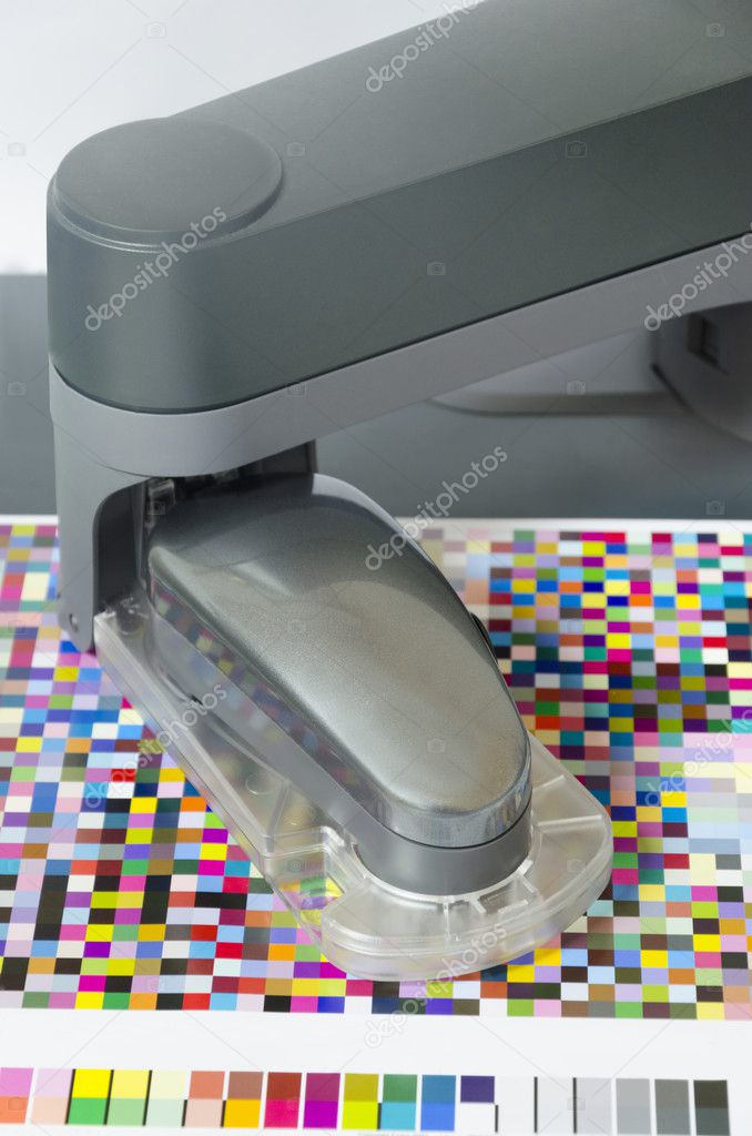 Icc profile, spectrophotometer robot measures color patches on Test ... Icc profile, spectrophotometer robot measures color patches on Test ...
