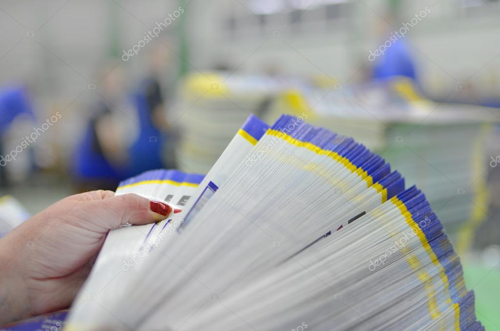 Manual control and count of printed material packets — Stock Photo ...