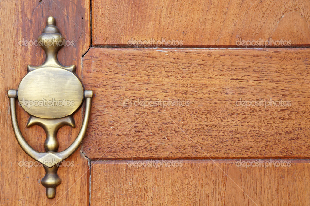 Ancient Golden Door Handle on a Brown Aged Wooden Door Stock Photo by ...