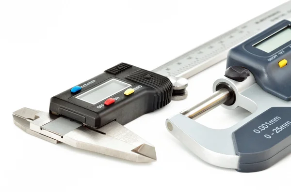 Digital caliper and micrometer Stock Photo by ©florinoprea1 17440409