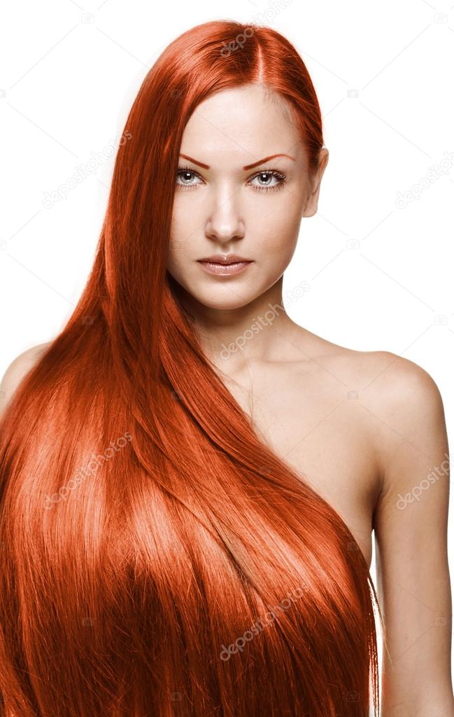 Portrait Of A Beautiful Young Woman With Elegant Long Red Shiny Hair