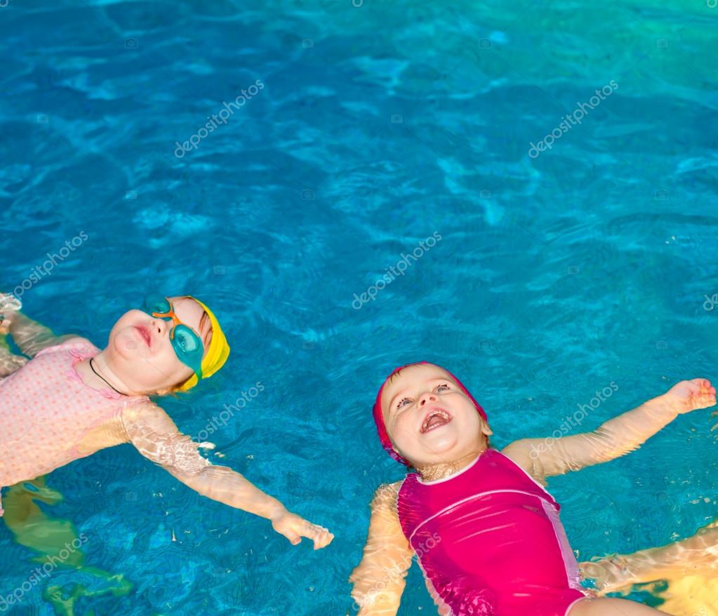 Children in a swimming pool Stock Photo by ©dnaumoid 13564805