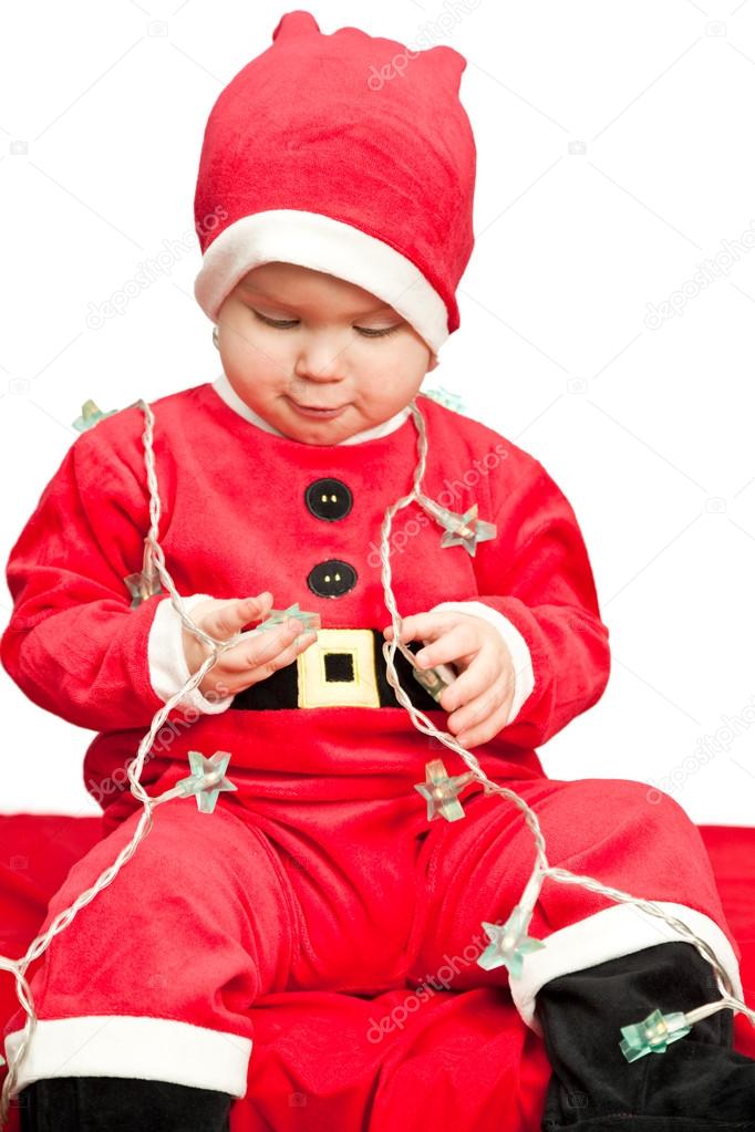 Baby wearing Santa suit Stock Photo by ©dnaumoid 13671438
