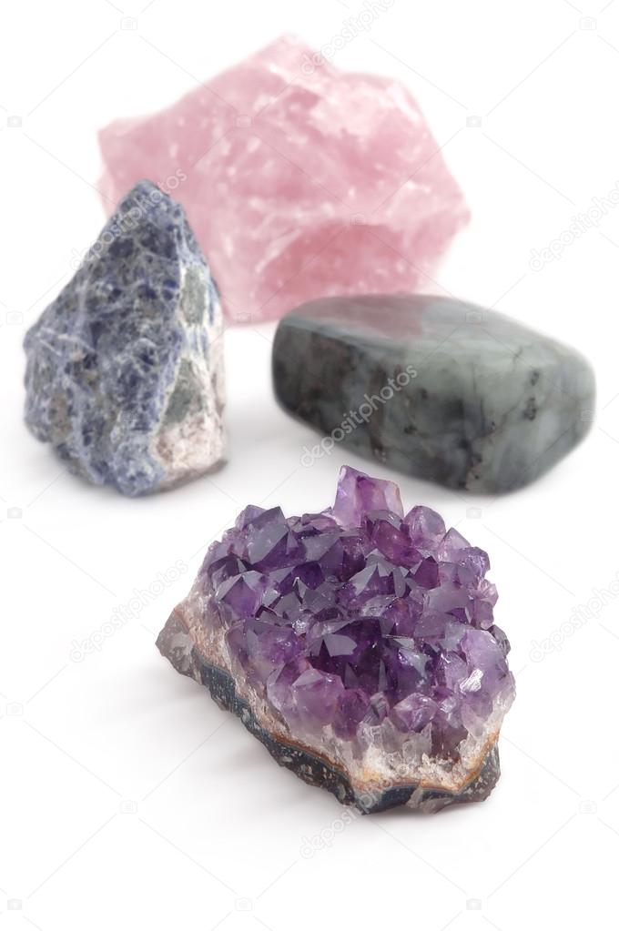 Four big different gemstones (crystals) on white background Stock Photo ...