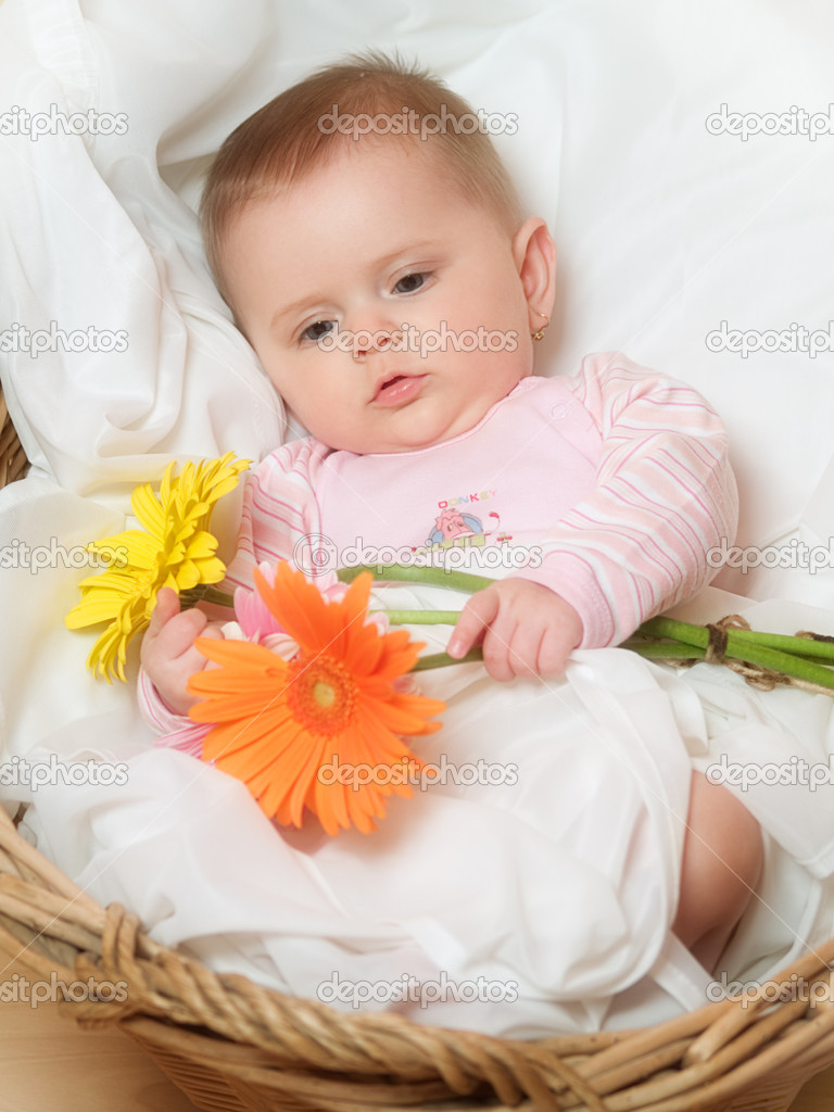 Baby with flowers Stock Photo by ©fiamoli 16935743