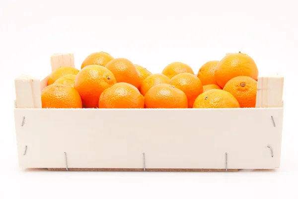 Wodden box full of mandarines on white background Stock Photo by ...