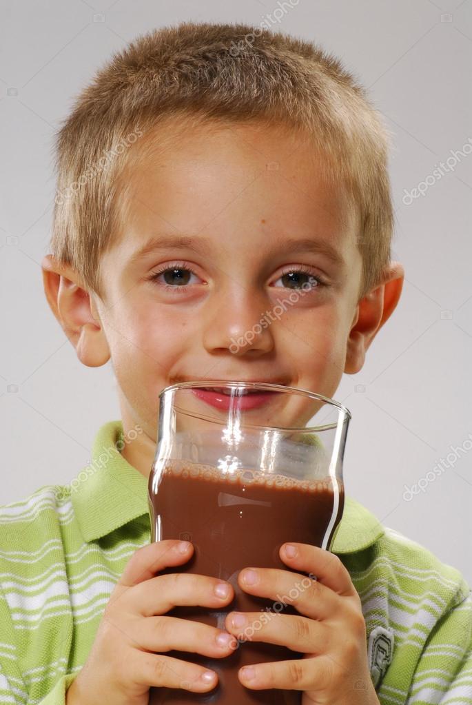 Little boy drinking chocolate drink,happy boy drinking milk, — Stock ...