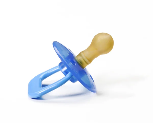 Blue pacifier isolated on white background. — Stock Photo ...