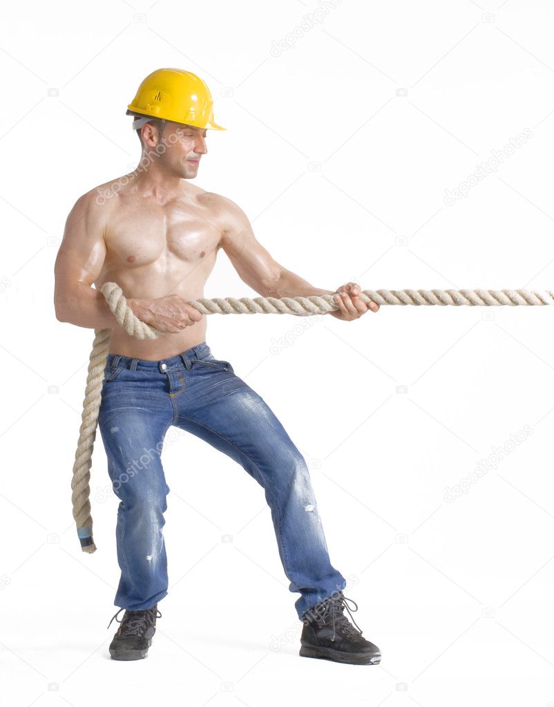 Constructor worker pulling a big rope on white background. — Stock ...