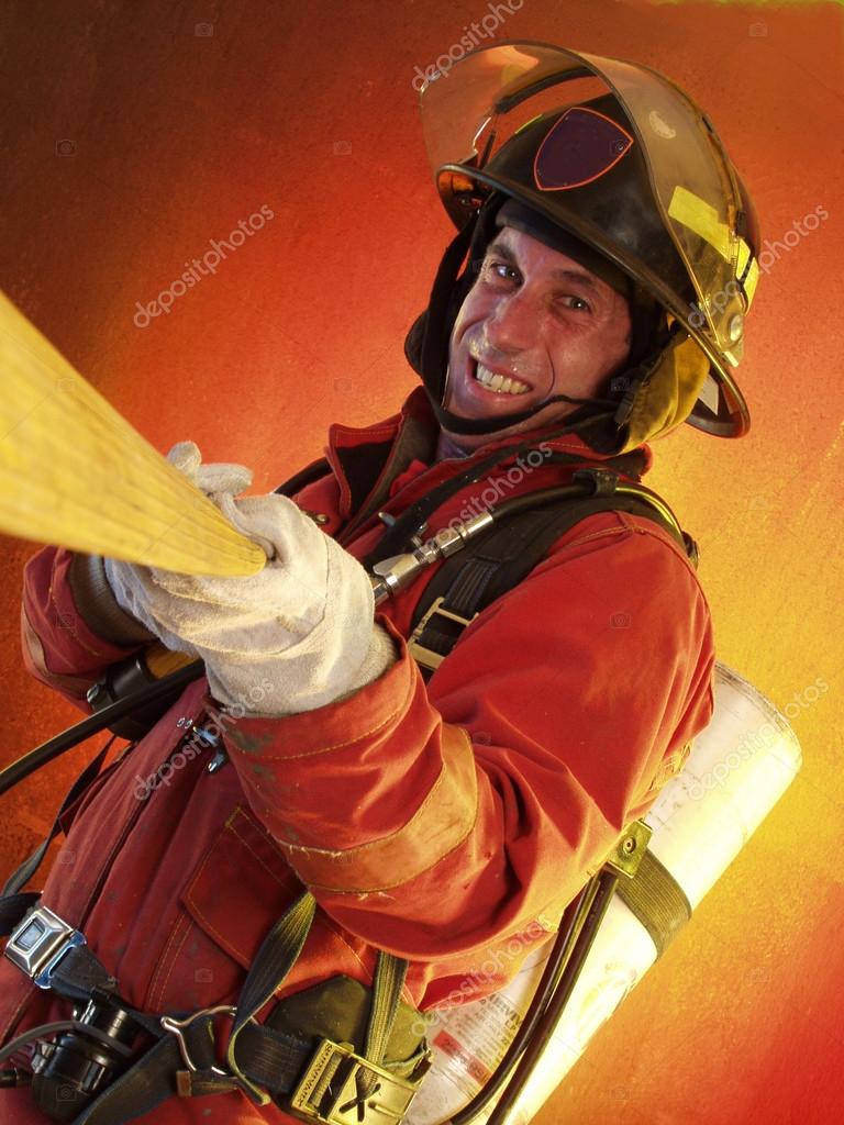 Firefighter in action. — Stock Photo © gosphotodesign #14912189