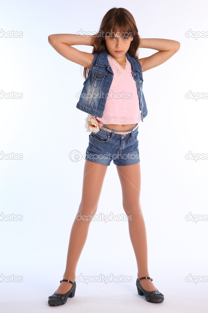 Young model posing in denim suit Stock Photo by ©AntonioClemens 14648989