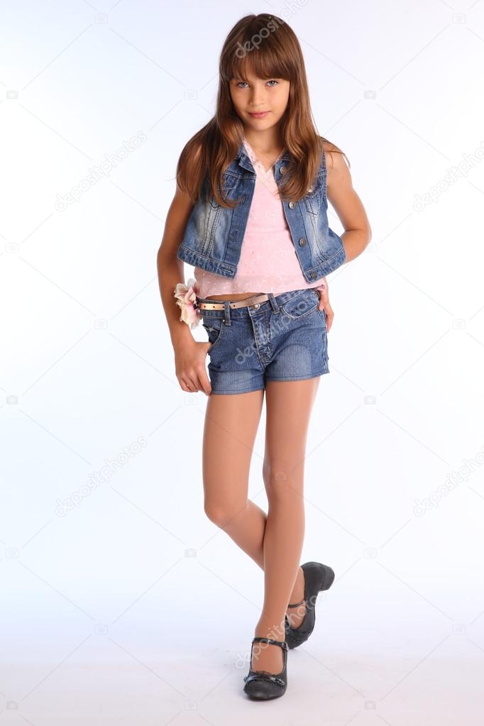 Young model posing in denim suit — Stock Photo © AntonioClemens #14649059