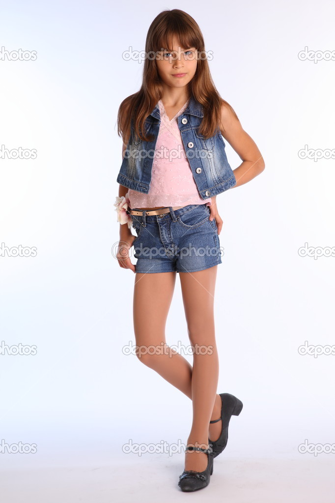 Young model posing in denim suit Stock Photo by ©AntonioClemens 14649109