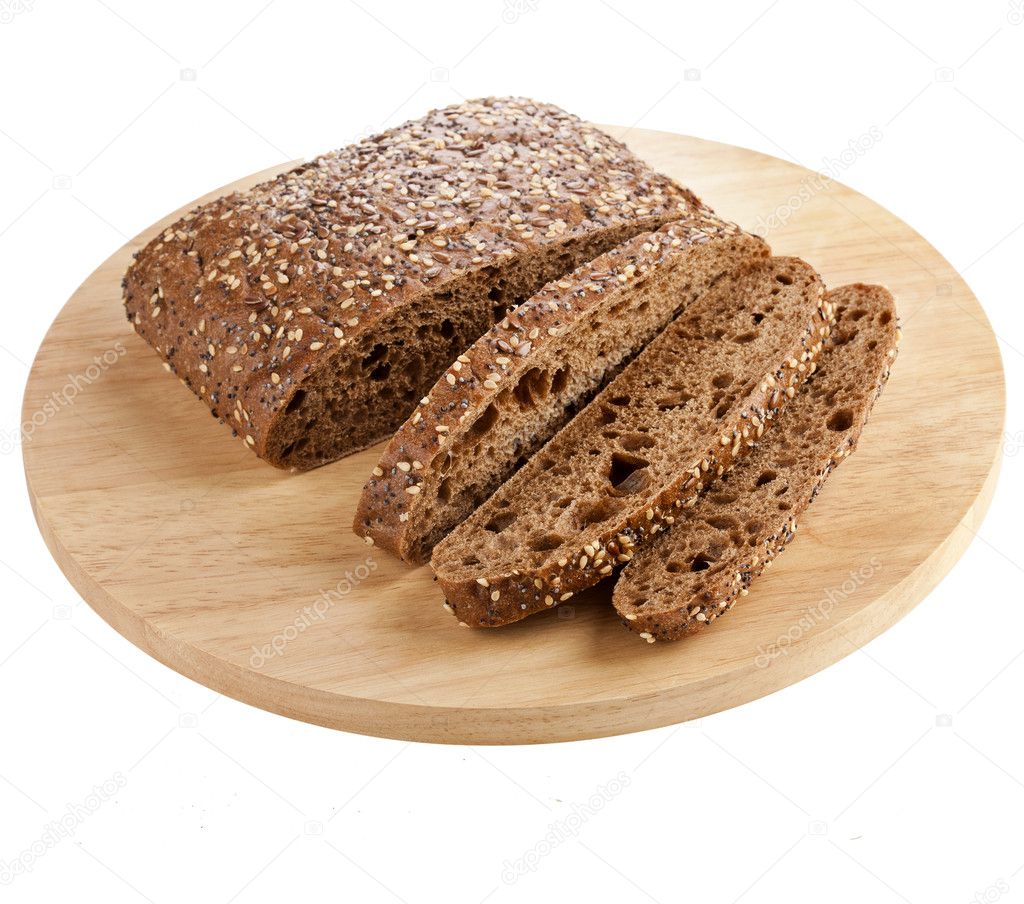 Rye bread with sesame seeds, flax, coriander on board Stock Photo by ...