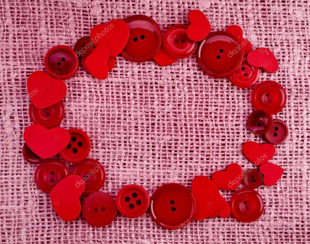 Border frame of red buttons hearts on canvas burlap background texture ...