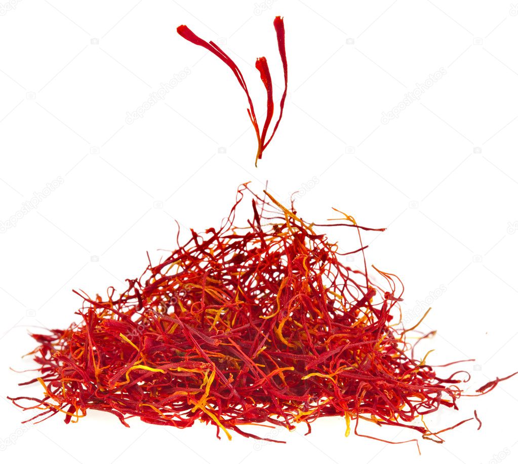 Heap pile of saffron close up macro shot isolated on white background ...