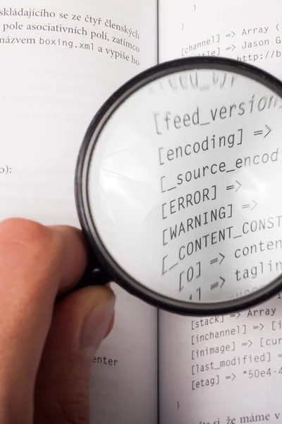 Magnifying glass in hand and text - business background — Stock Photo ...