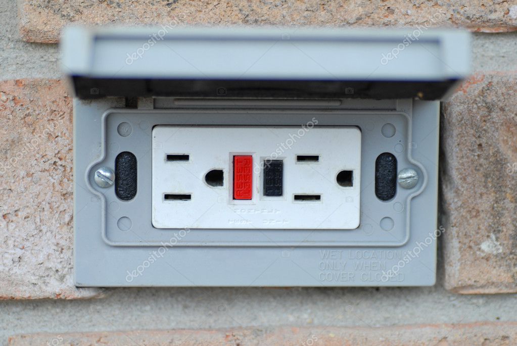 Grounded outdoor electrical socket on brick wall ⬇ Stock Photo, Image ...