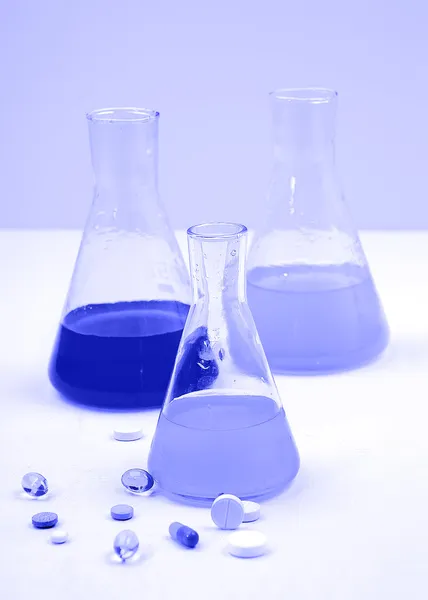 Composition of laboratory material with colored liquids in realistic ...