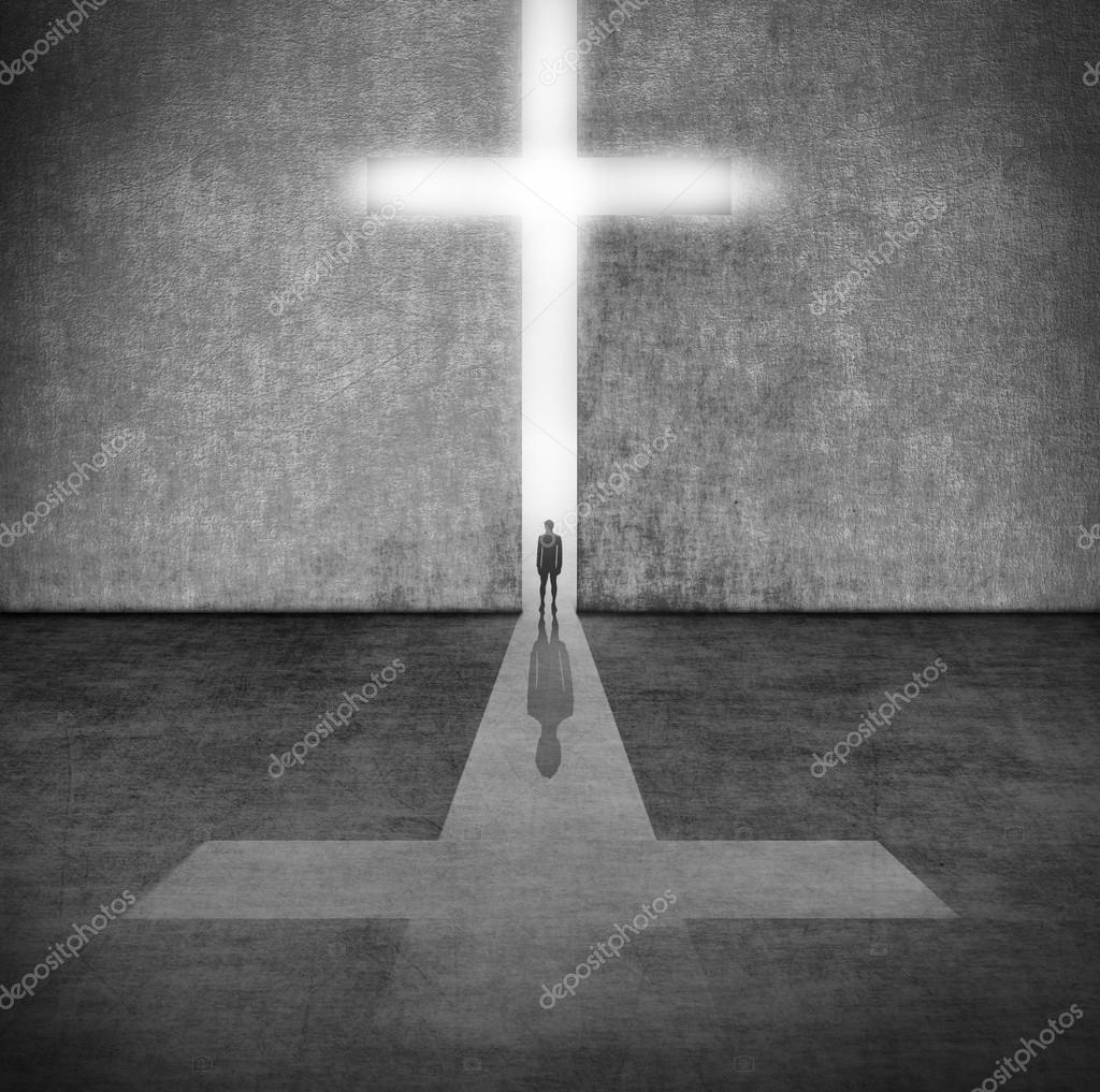 Silueta de una persona ante un símbolo de fe — Foto de stock © Kasza ...