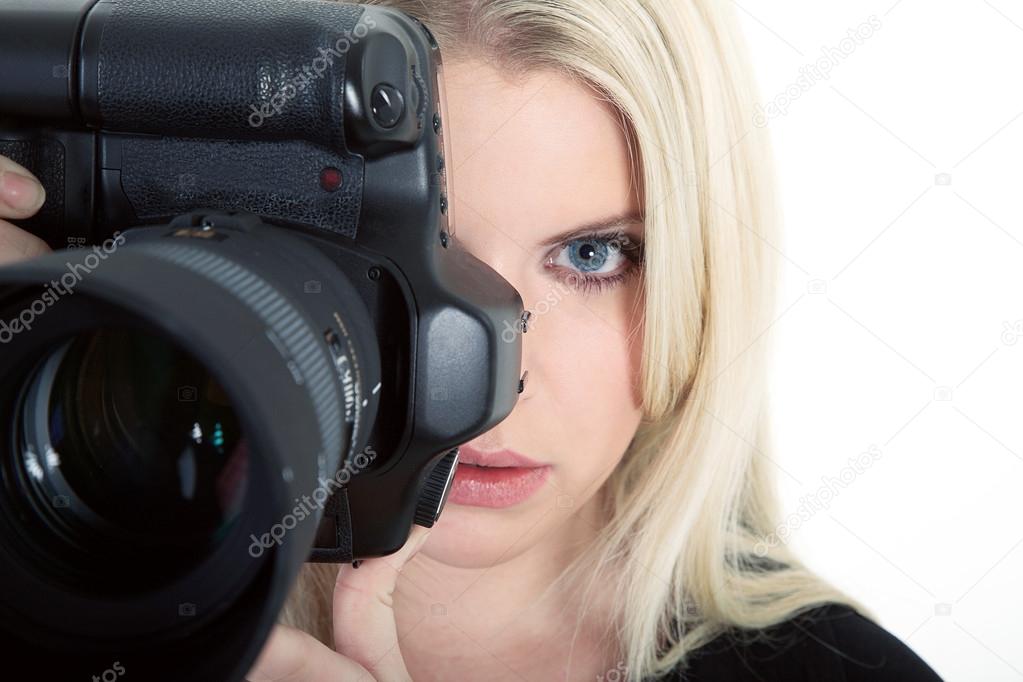 Blonde girl with camera — Stock Photo © Nick_Freund #28517653