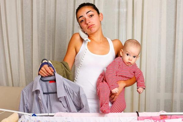 Multi-tasking mother - Stock Image - Everypixel