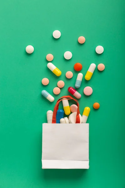 Various medicines, medical and pharmaceutical products in paper bags ...