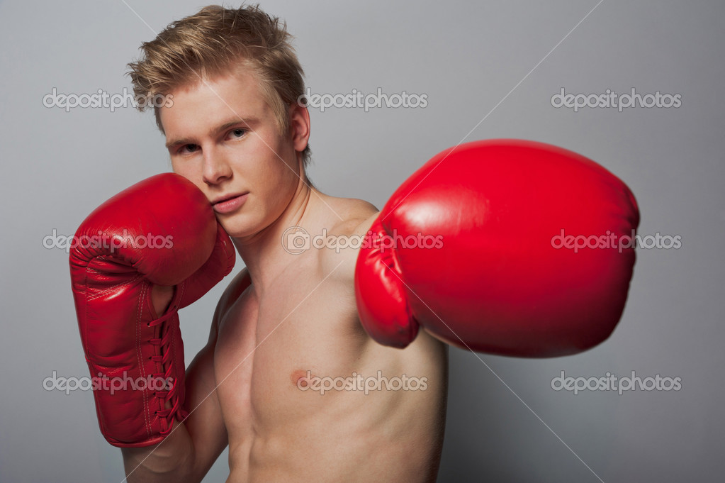 Young man boxing Stock Photo by ©maxsaf 32461997