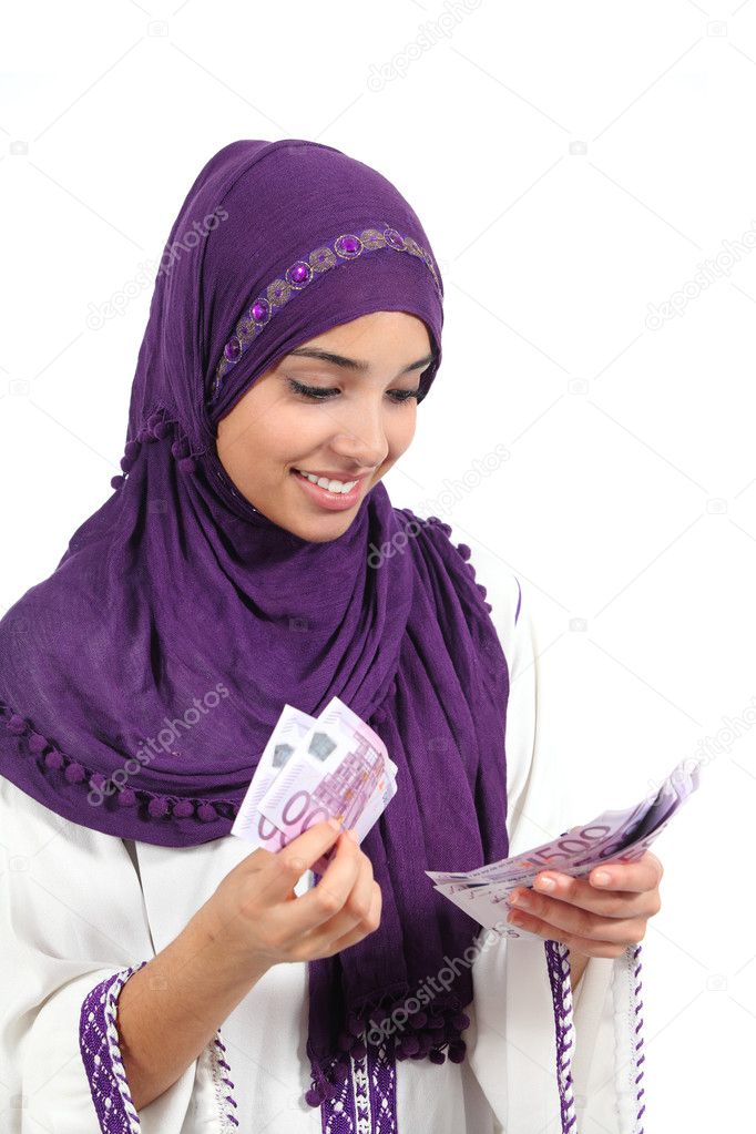 Beautiful arab woman counting a lot of five hundred euros banknotes ...