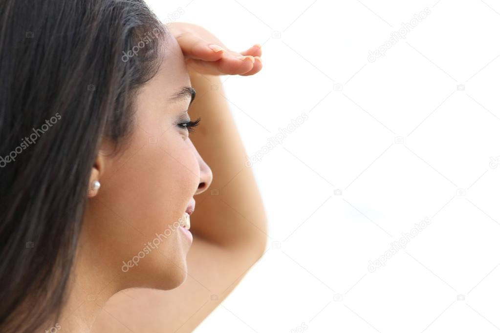Close up of a beautiful woman looking with a hand in forehead — Stock ...